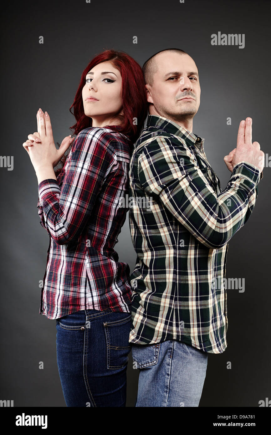 Pretty woman with guns hi-res stock photography and images - Alamy
