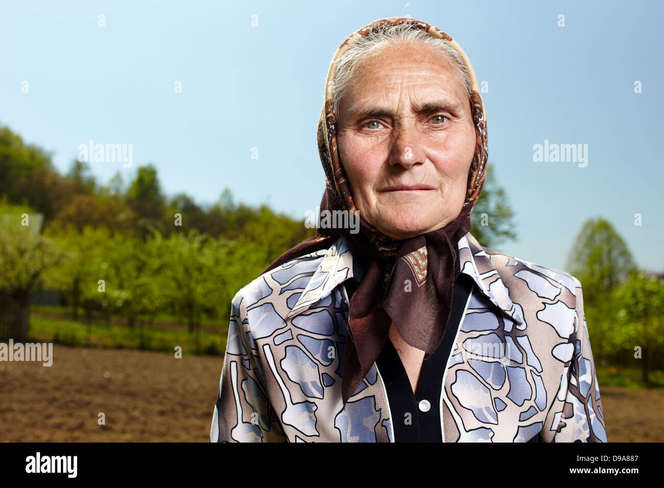 Senior woman thinking countryside hi-res stock photography and images ...