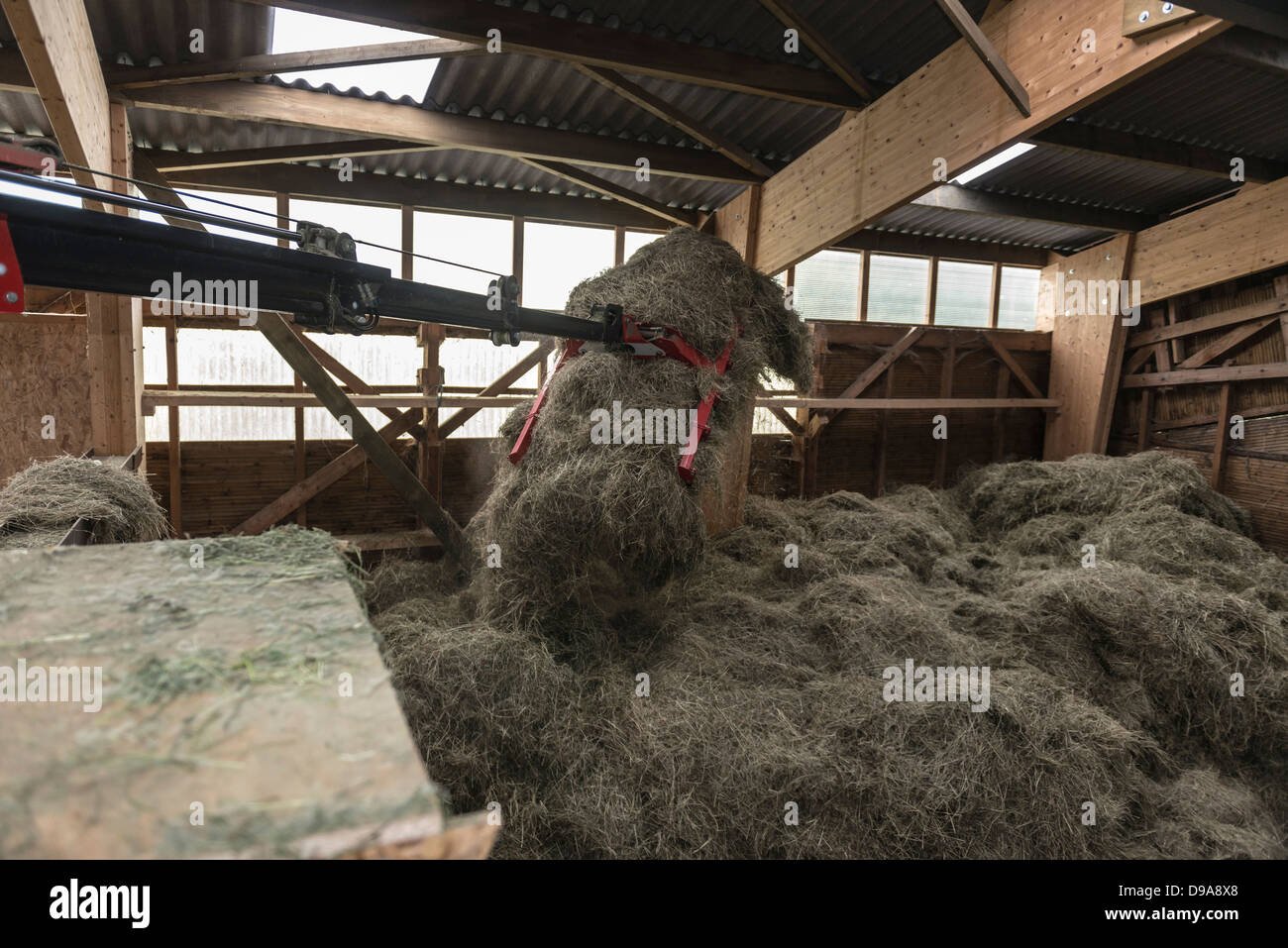 Overhead ceiling mounted crane for storage and retrivial of hay, straw ...