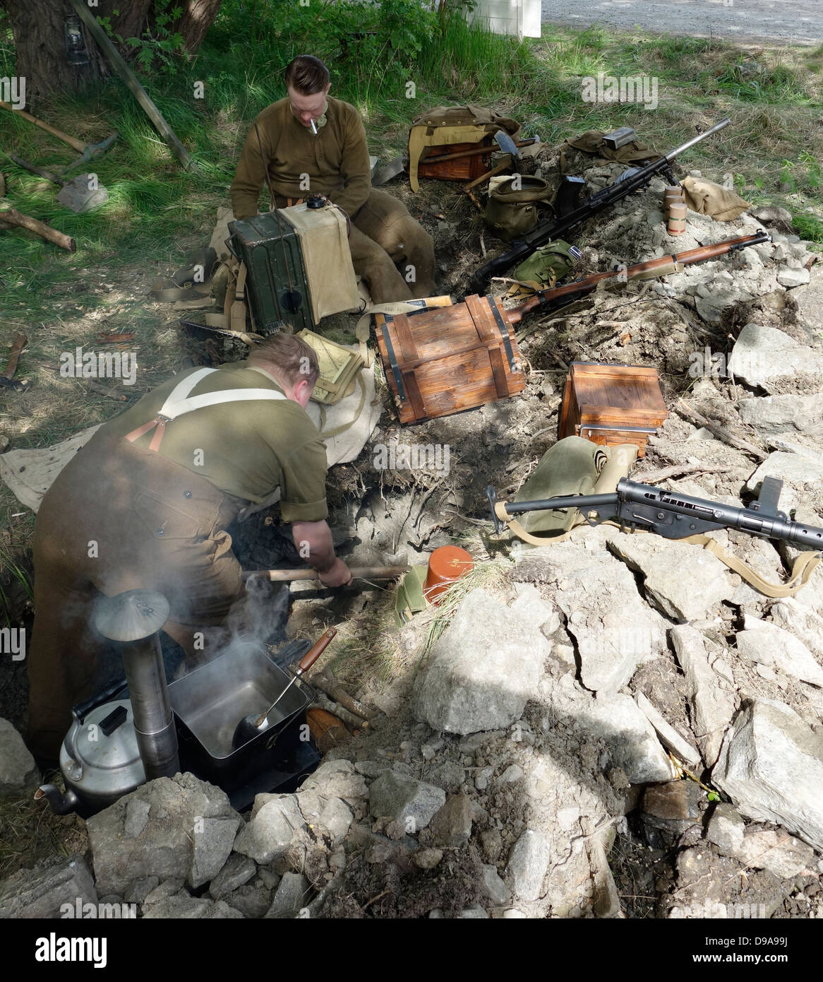 Historical re-enactment of ww2. British soldiers dig the trench Stock ...