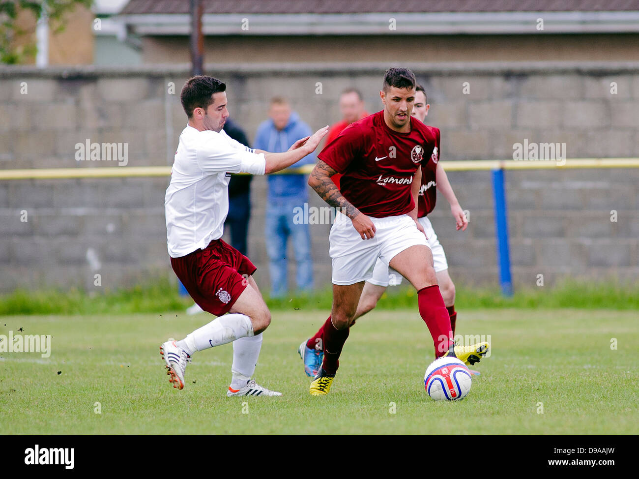 Mark Forbes goes by Adam Nelson during the East Region Super League ...