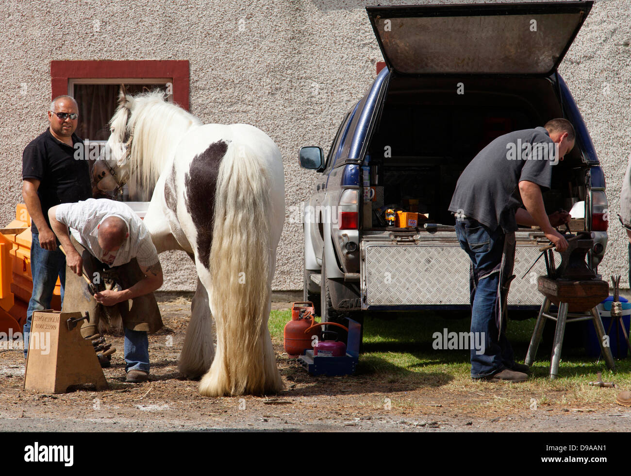 A mobile Farrier hot shoeing horses at the Appleby Horse Fair, Appleby ...
