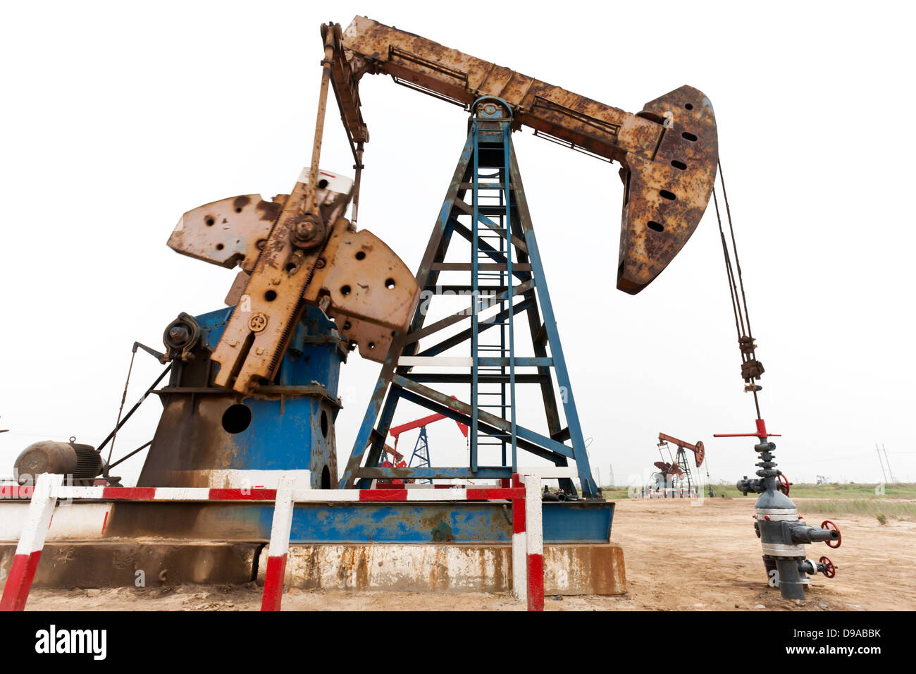 Working oil pumps at prairie Stock Photo - Alamy