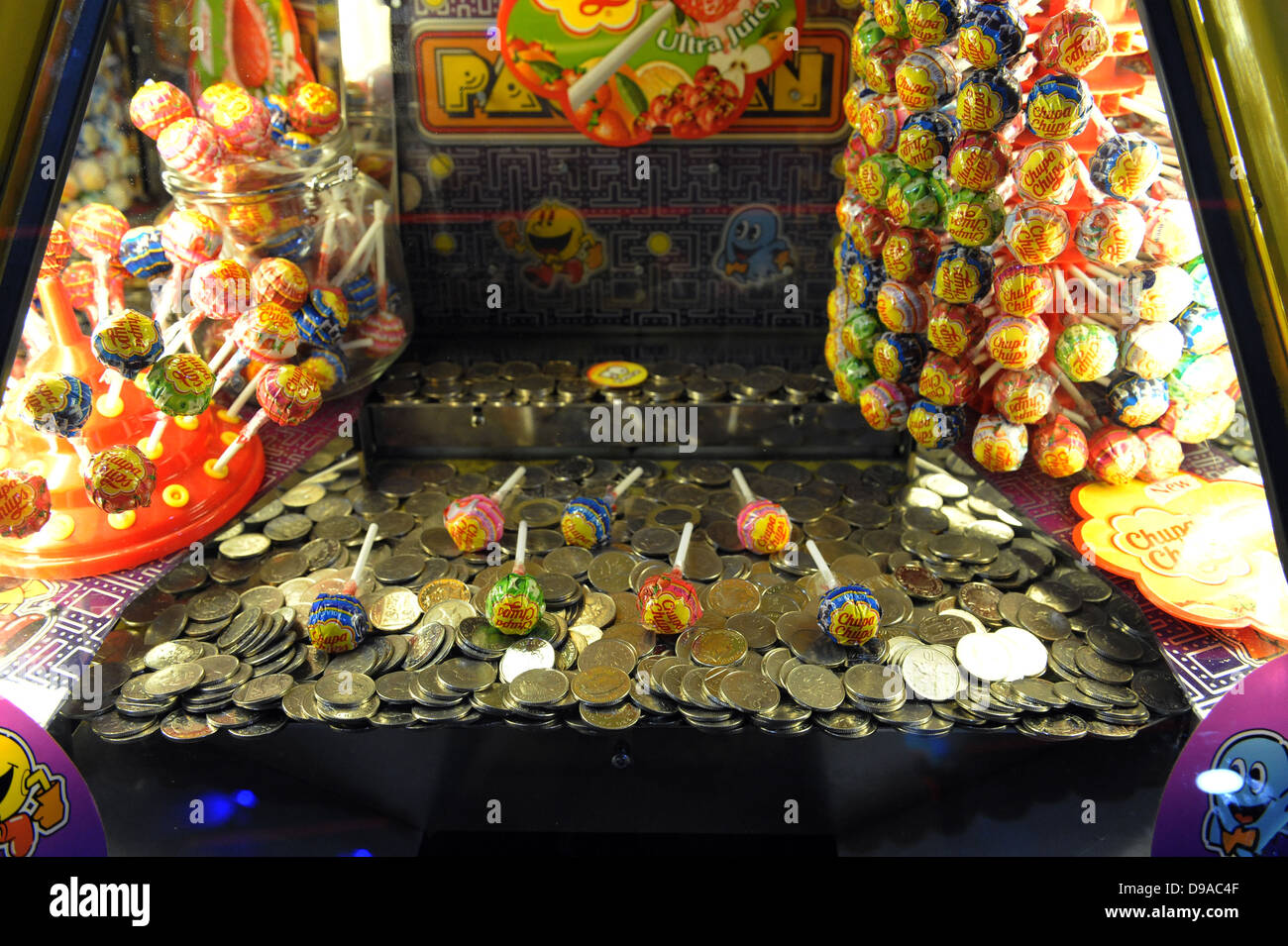 A pusher type gambling machine in the Namco arcade in london, South ...