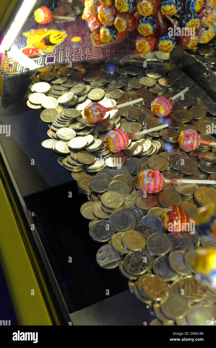 A pusher type gambling machine in the Namco arcade in london, South ...