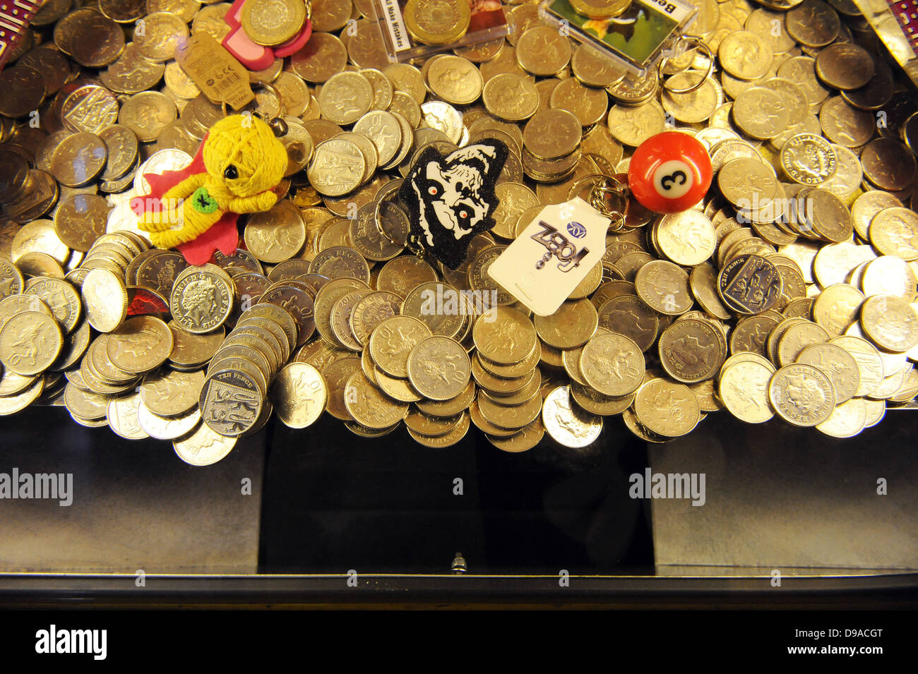A pusher type gambling machine in the Namco arcade in london, South ...