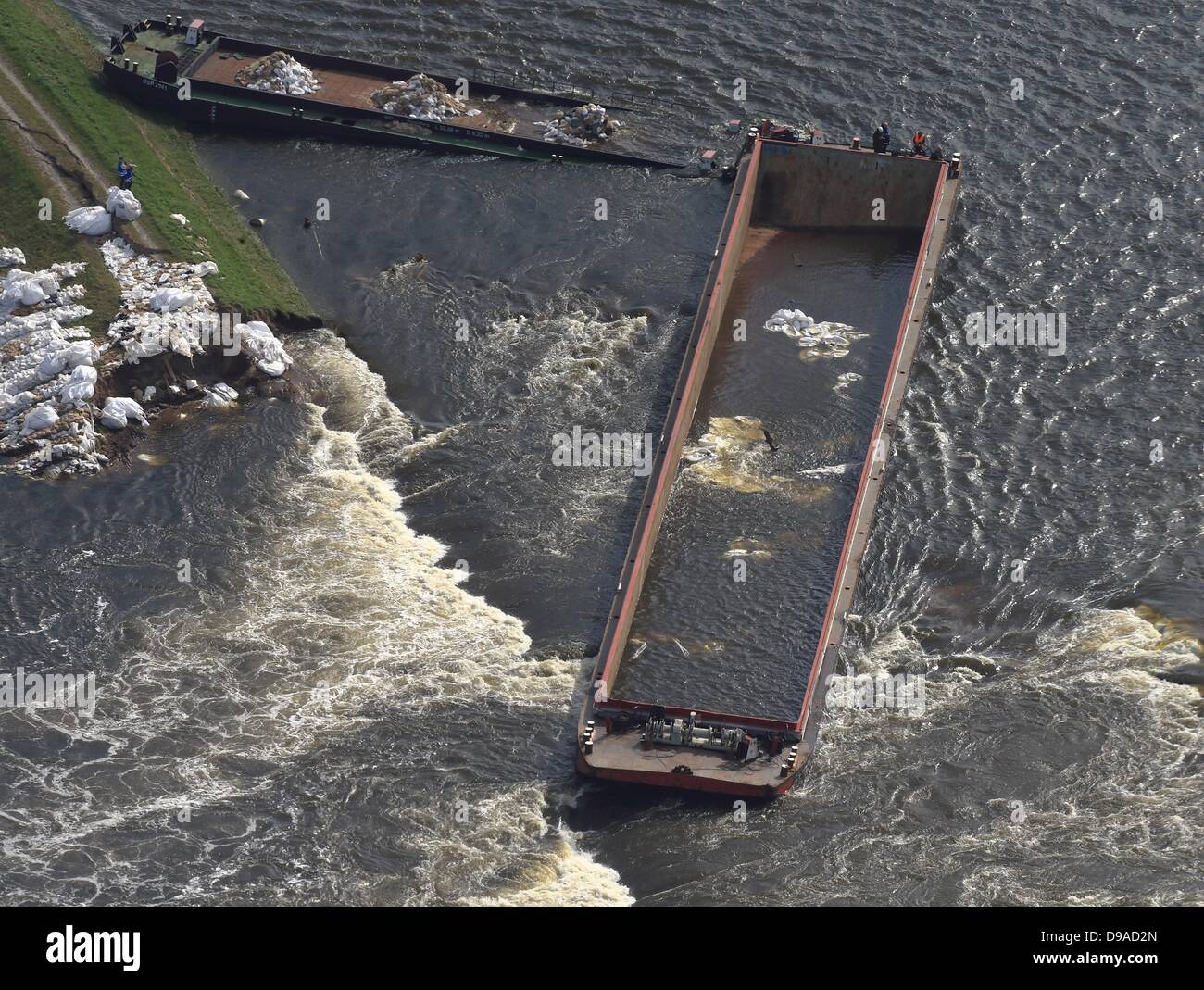 Fischbeck, Germany. 16th June, 2013. View of two cargo barges, which ...