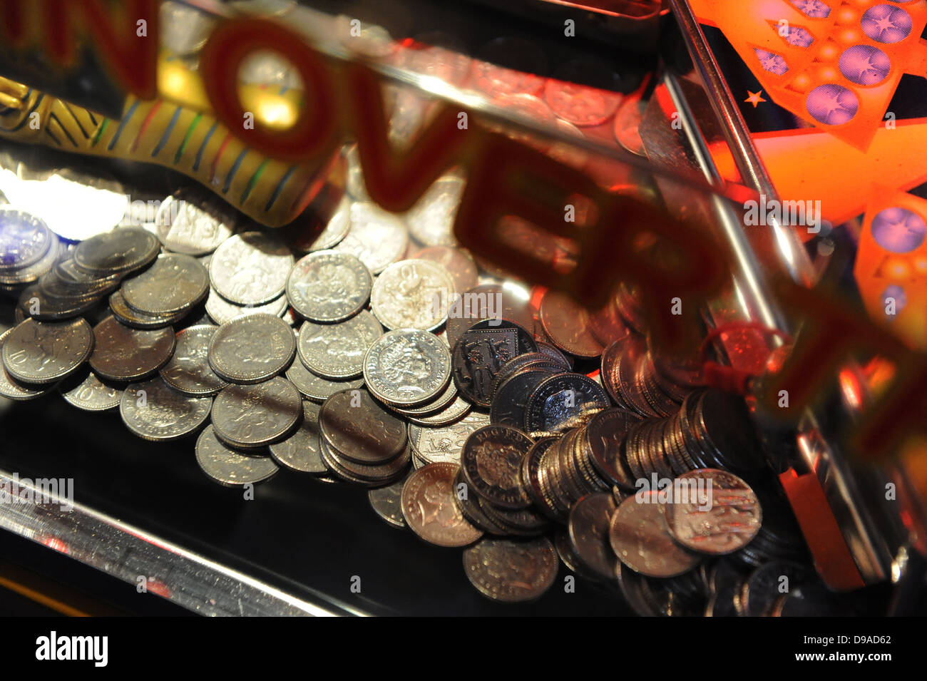 A pusher type gambling machine in the Namco arcade in london, South ...