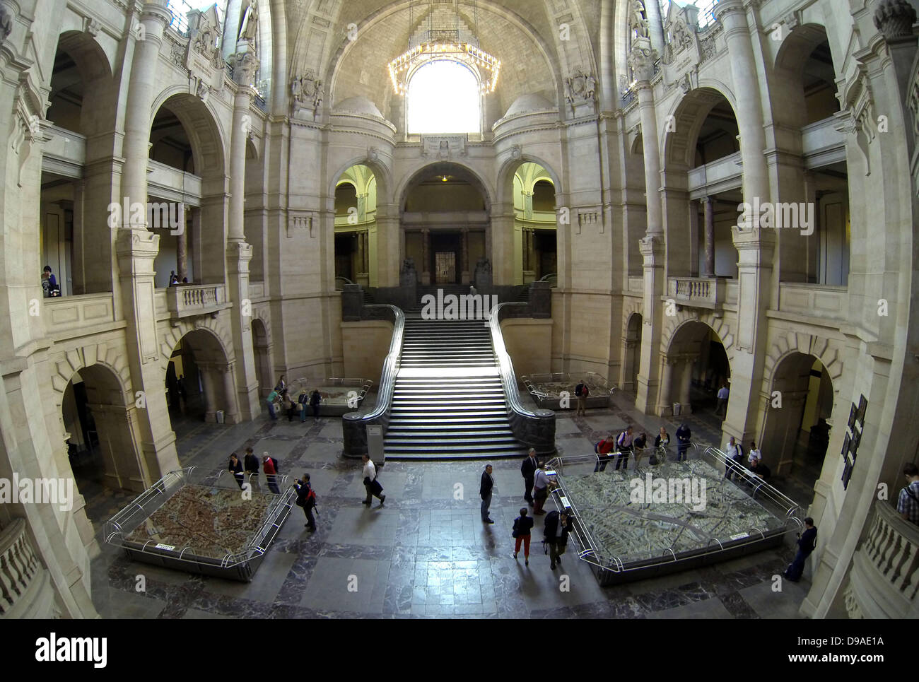 Visitor walk through the hall of the New Town Hall in Hanover, Germany ...