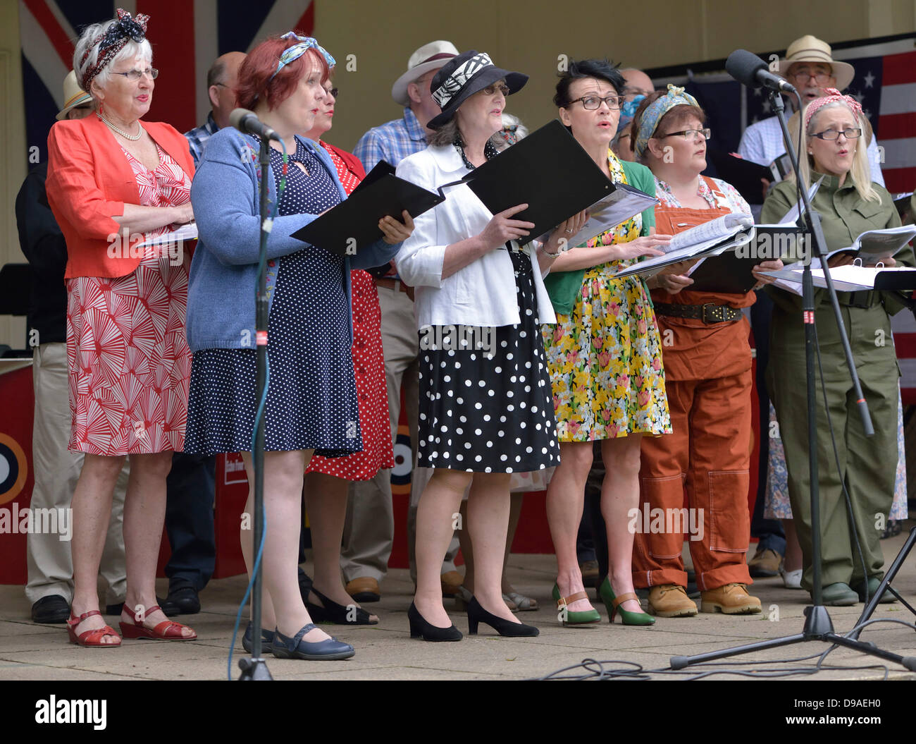 Harrogate, Yorkshire, UK. 16th June, 2013. Singers in 1940's dress sing ...