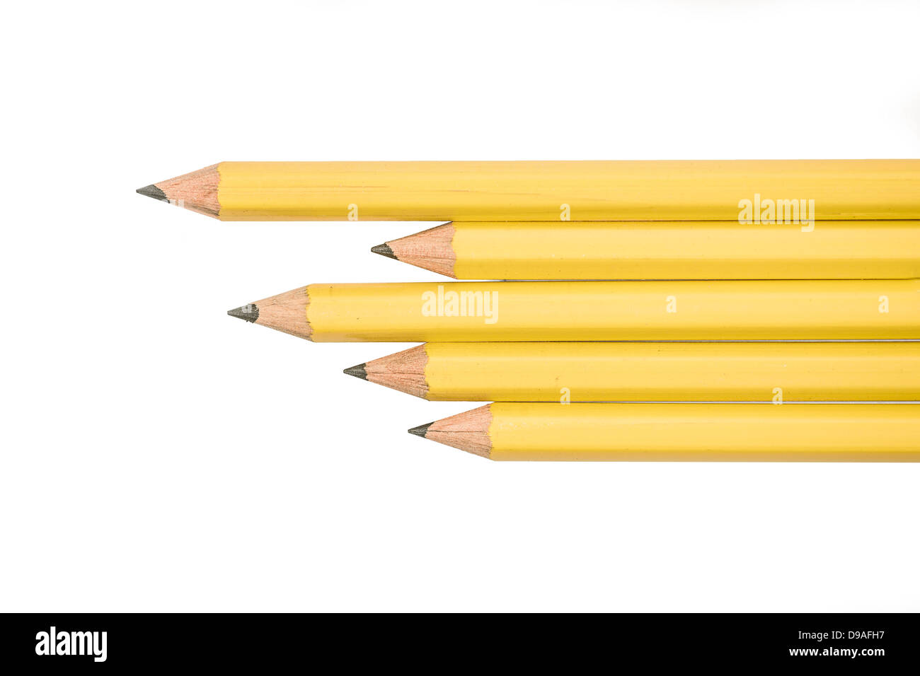 Unique arrangement of simple pencils on a white background. Great for a ...