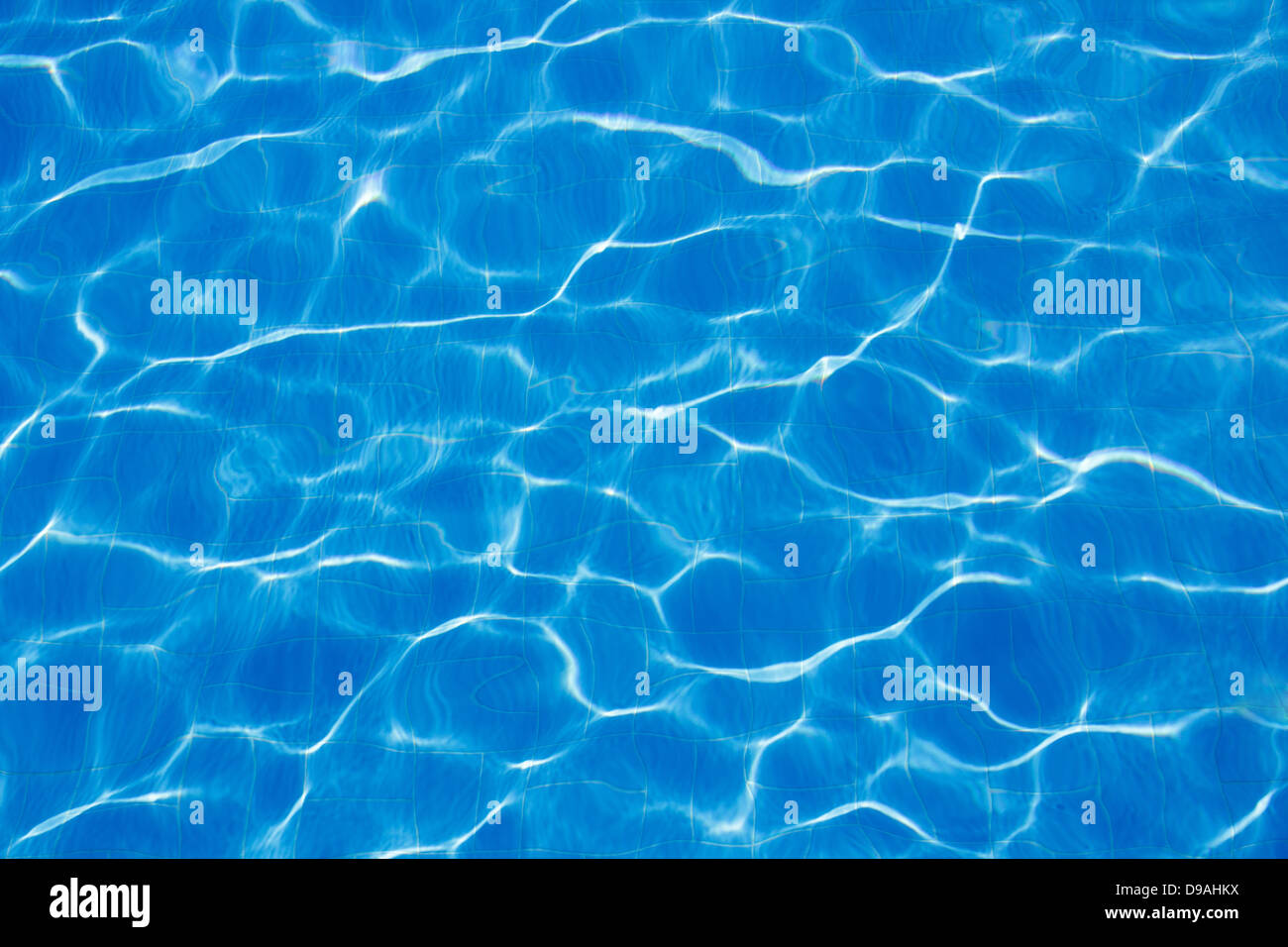Blue tiled swimming pool background hi-res stock photography and images ...