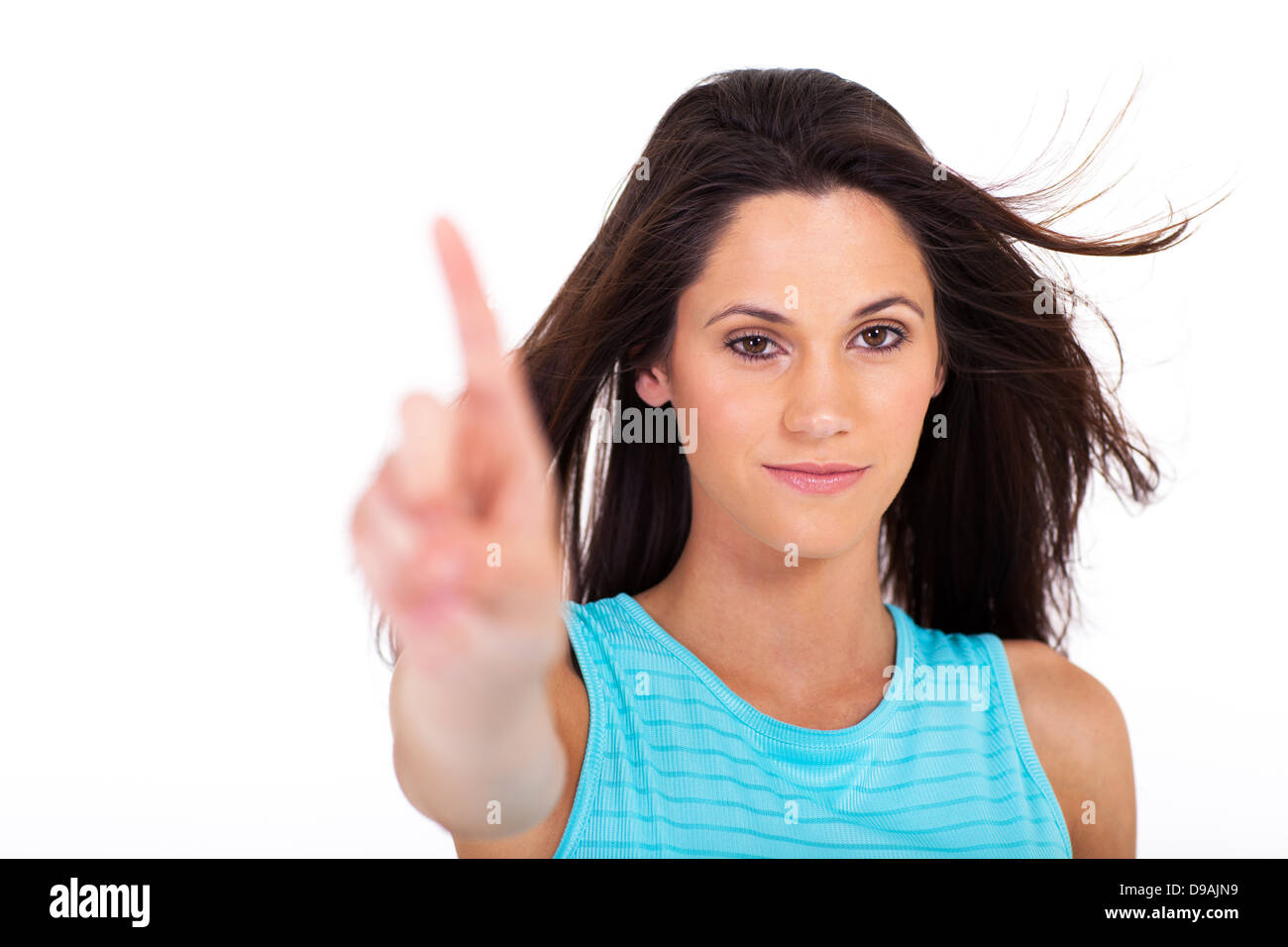 young woman giving no sign over white background Stock Photo - Alamy