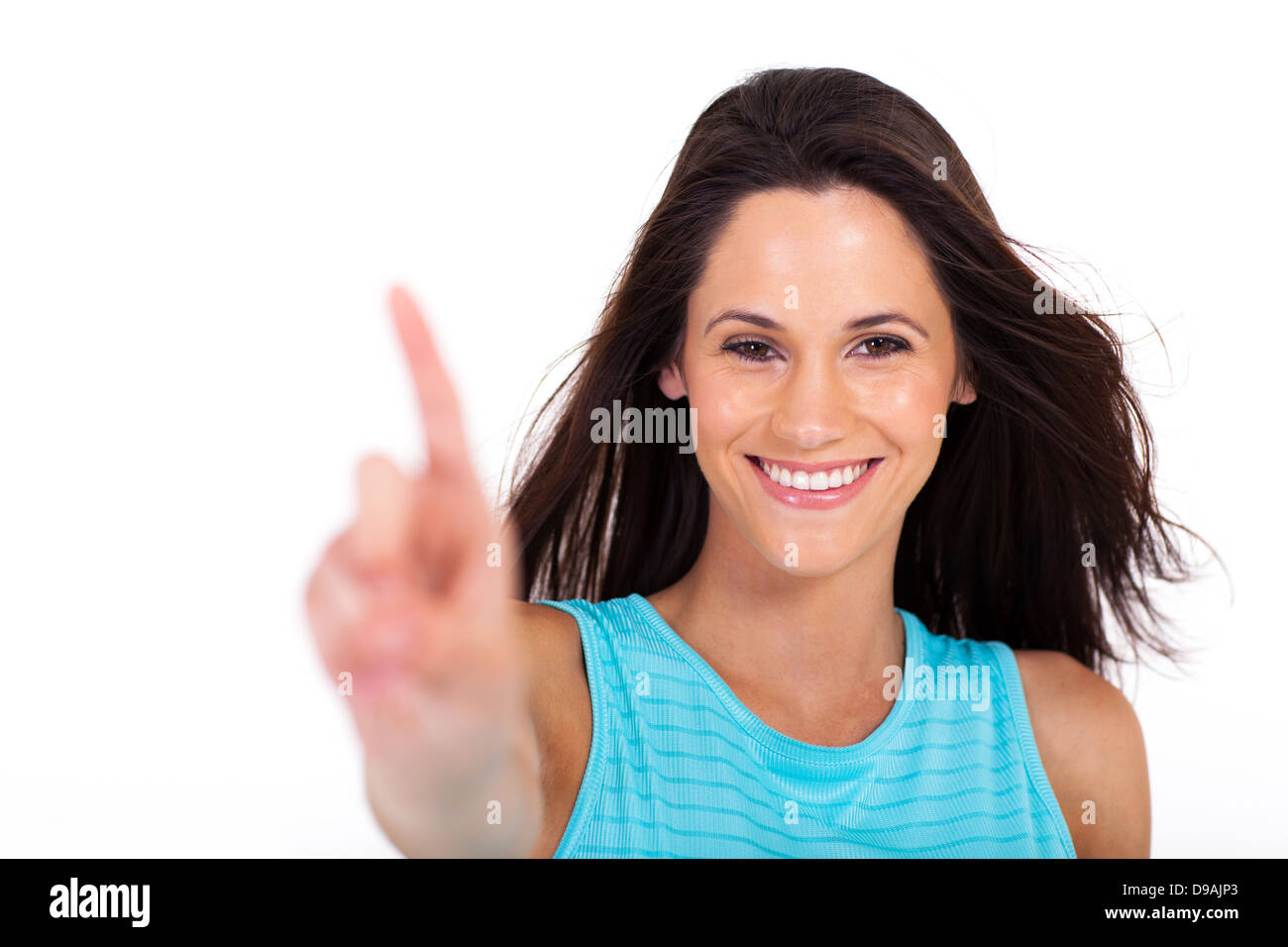 beautiful young woman giving one hand sign over white background Stock ...