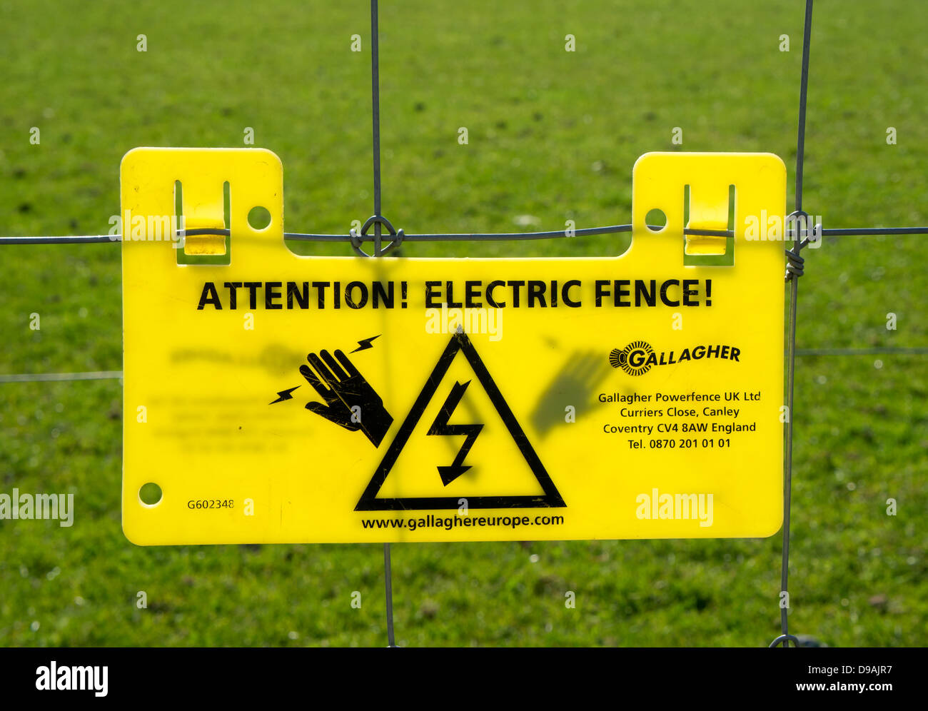 Electric Fence Warning Sign Stock Photo - Alamy