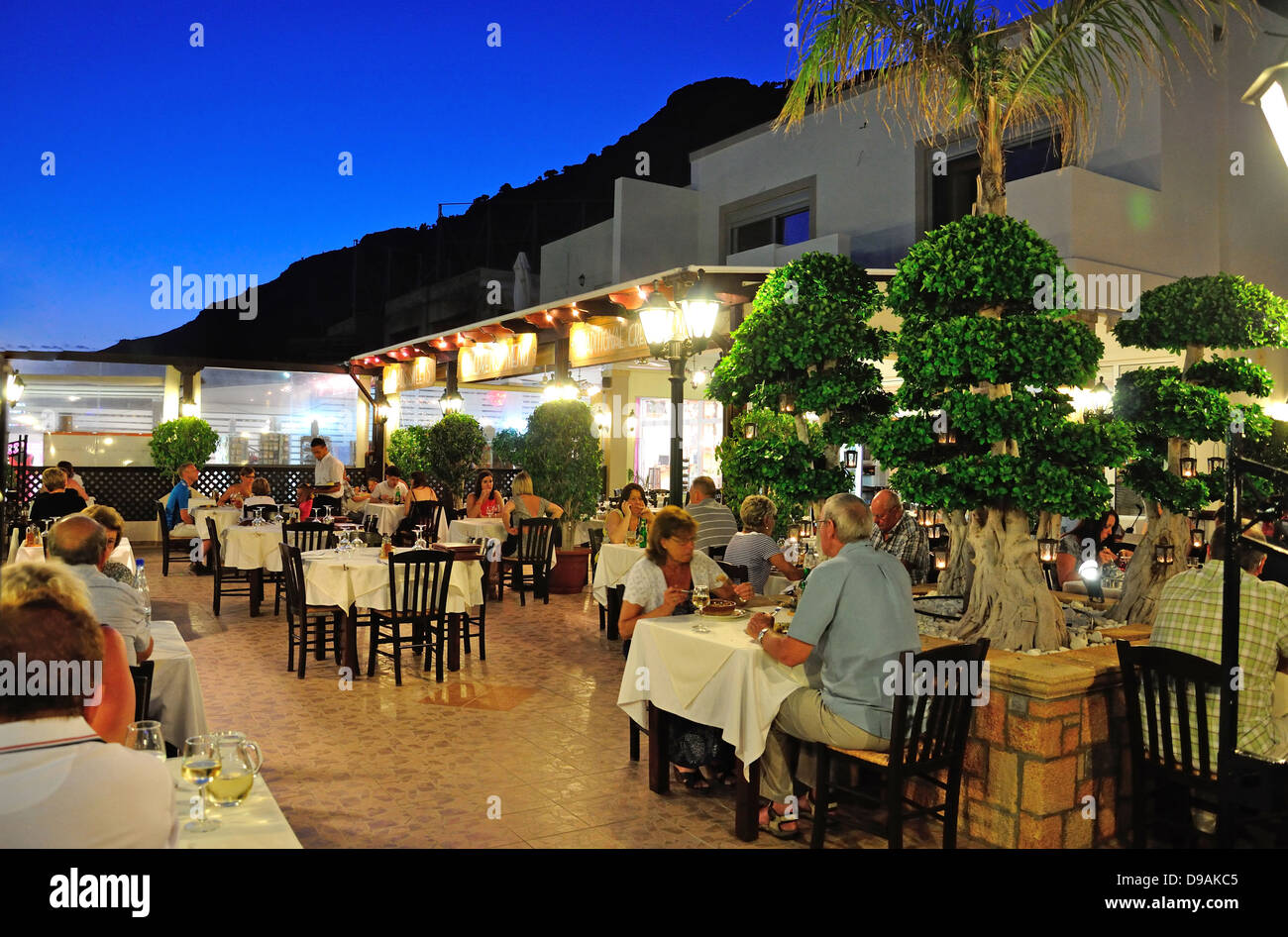 'Artemis' taverna at dusk, Pefkos, Rhodes (Rodos), The Dodecanese ...