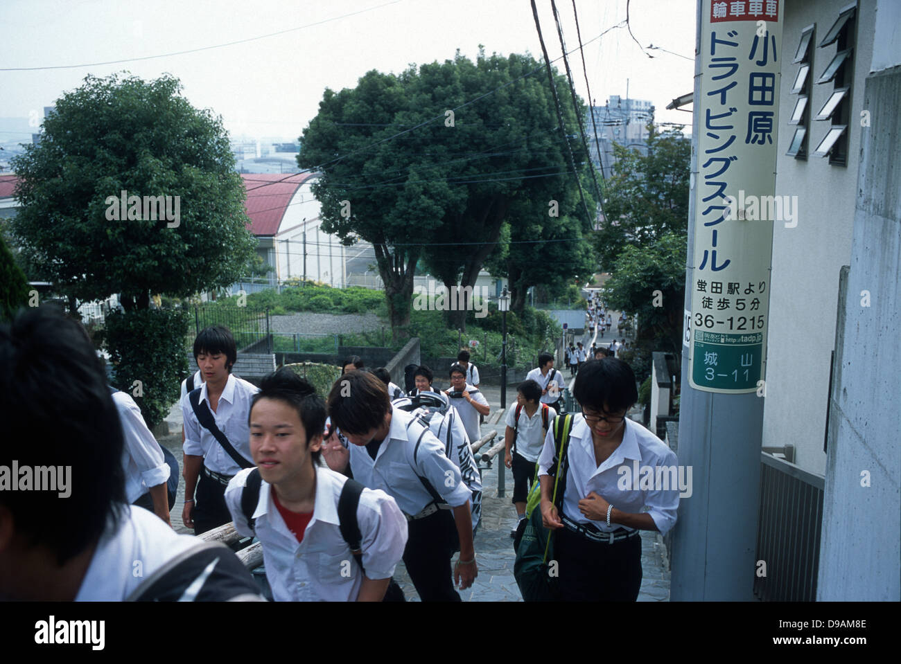 Japanese middle school students go to school in the morning in Odawara ...