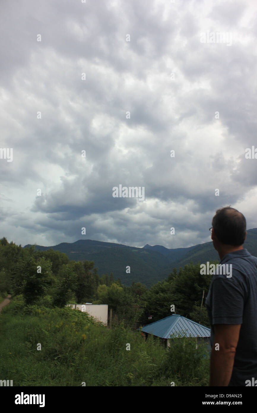 Watching the storm Stock Photo - Alamy