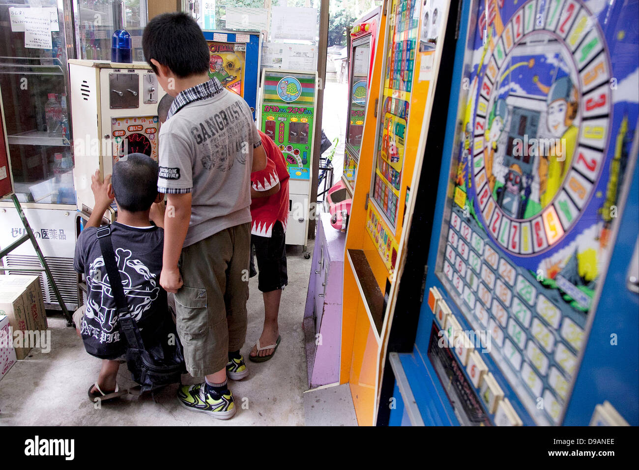Tokyo, Japan - Kids play with retro game machine at the Traditional ...