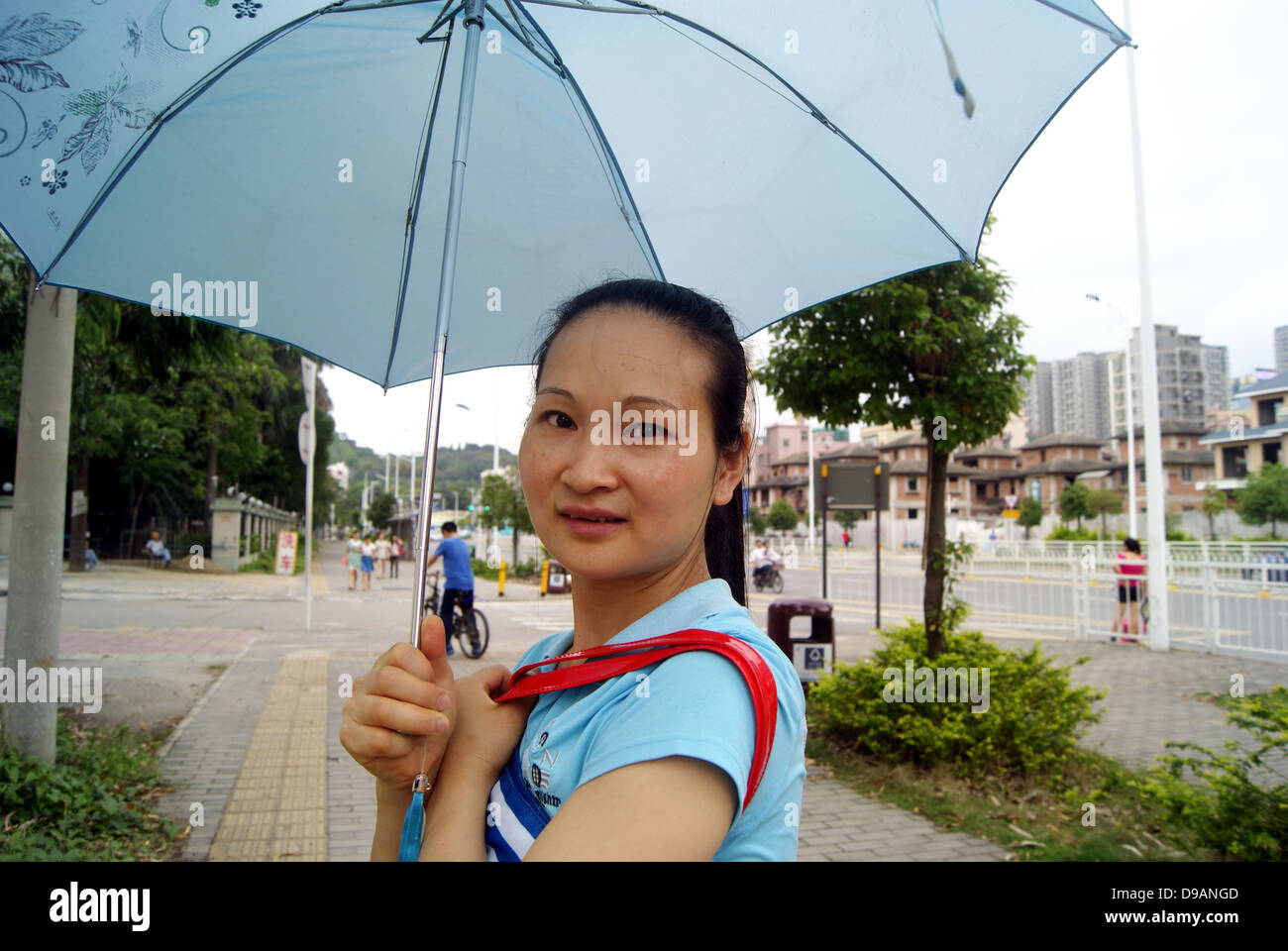 A Chinese woman, in tourist attractions Stock Photo - Alamy