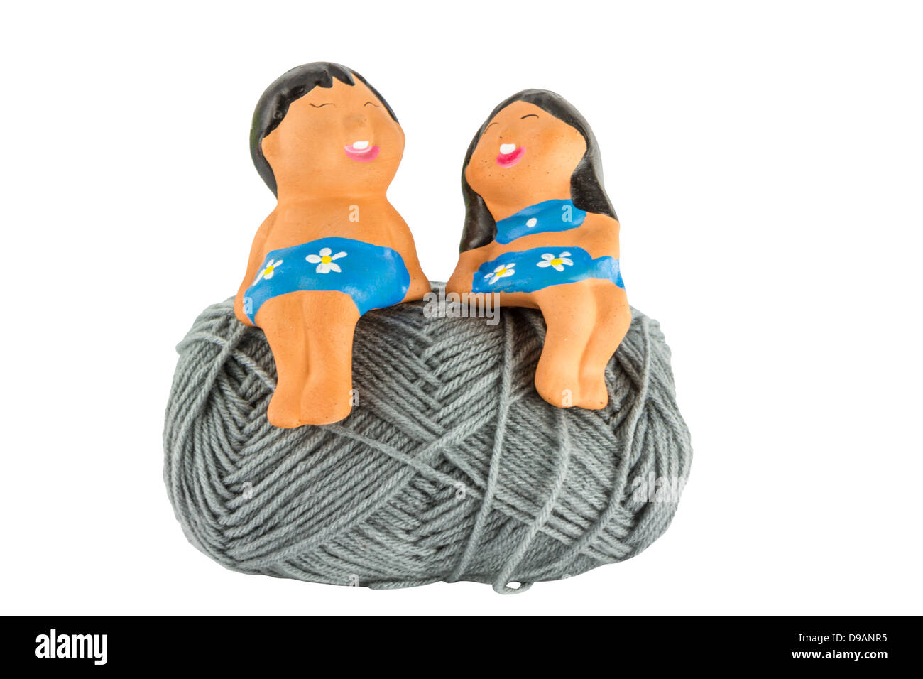 smile doll on ball yarn Stock Photo - Alamy