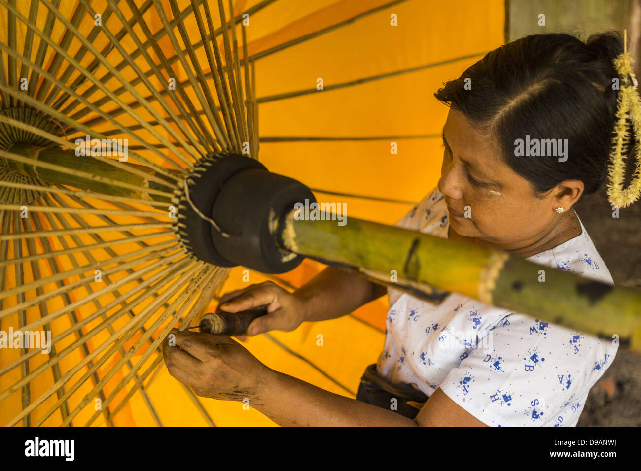 June 14, 2013 - Pathein, Ayeyarwady, Union of Myanmar - A worker ...