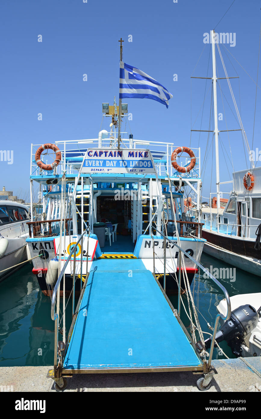 'Captain Mike' excursion boat in Mandraki Harbour, Old Town, City of ...