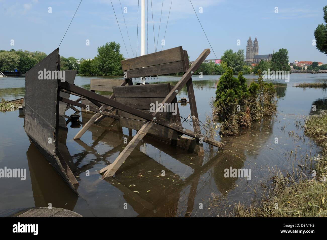 Benches in front of a restaurant were smashed down from the water when ...