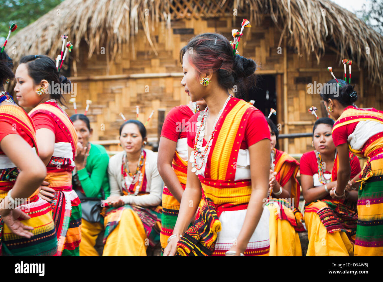 Naga tribal women in traditional outfit dancing in Hornbill Festival ...