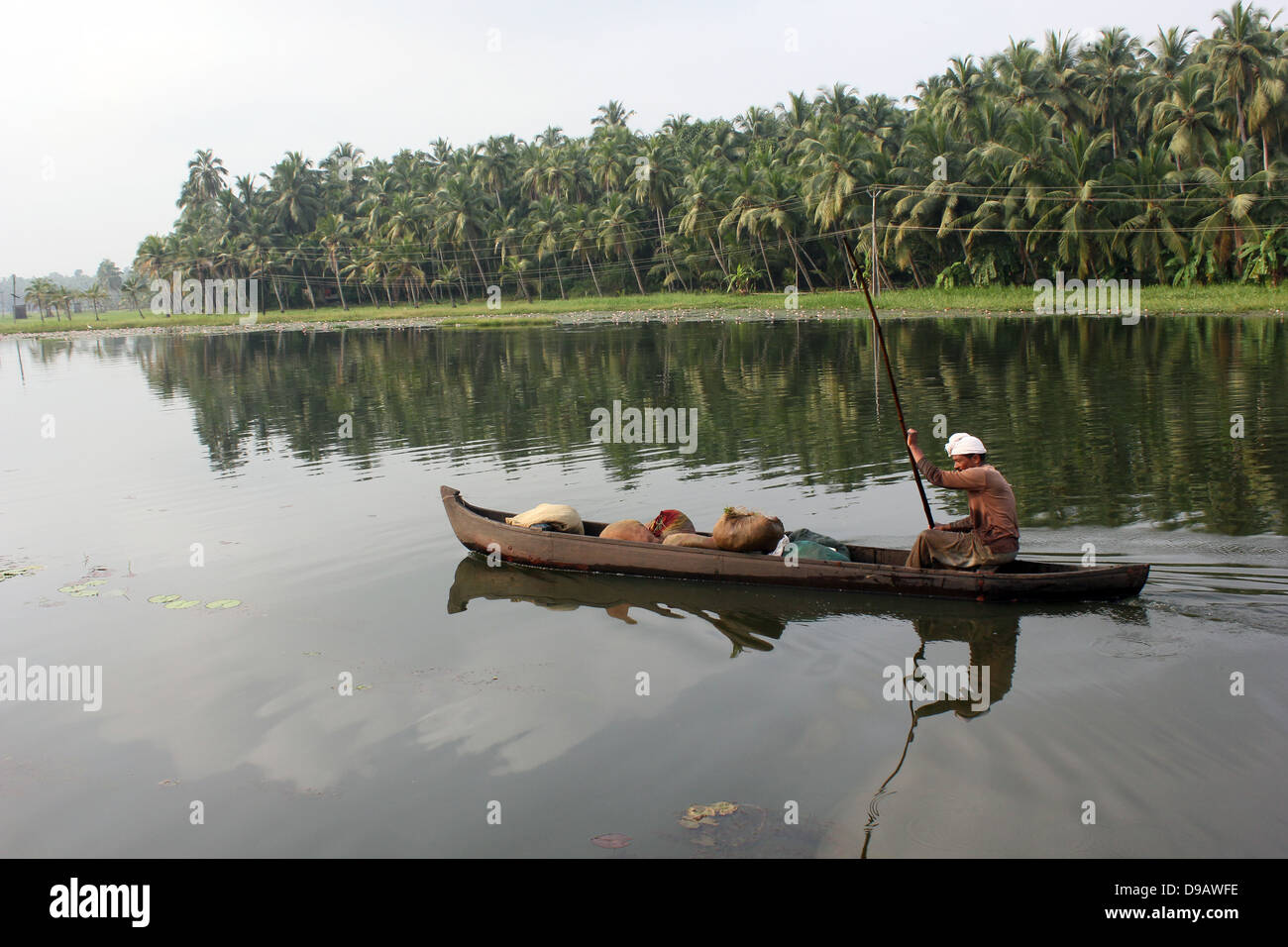 Indian man boatman rowing boat hi-res stock photography and images - Alamy