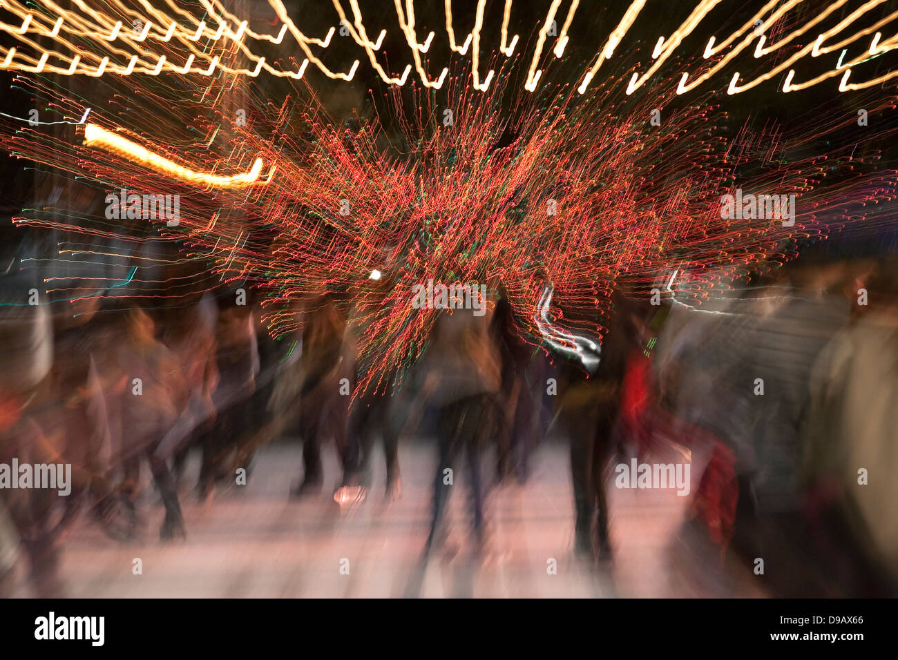 Ice skating at night with motion blur and lights and zoom effect Stock ...