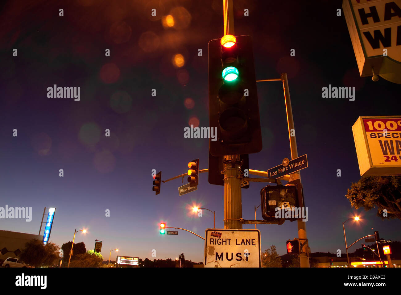 Multiple traffic lights against twilight blue sky Stock Photo - Alamy