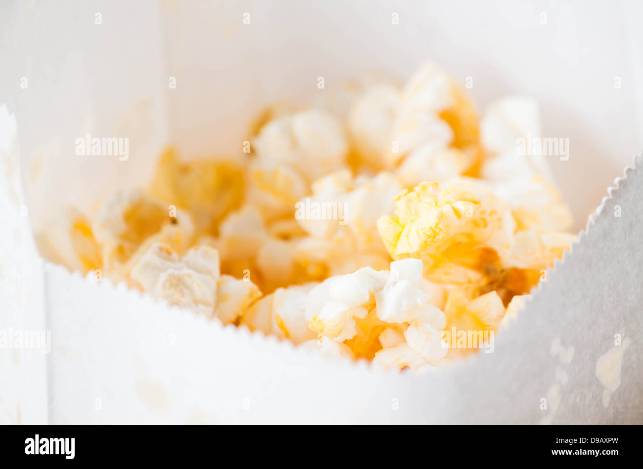 Bag of fresh butter popcorn up close Stock Photo - Alamy