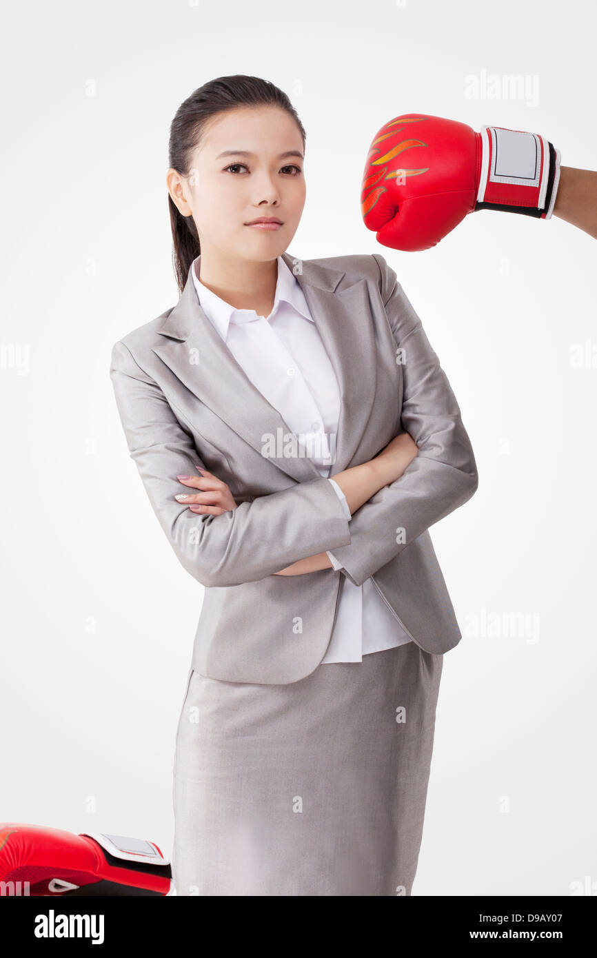 Business female beating by the opponents Stock Photo - Alamy