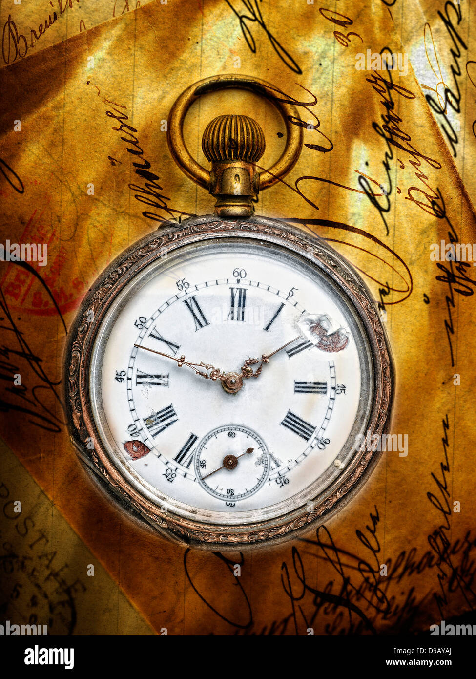 Pocket watch on letter, close up Stock Photo - Alamy