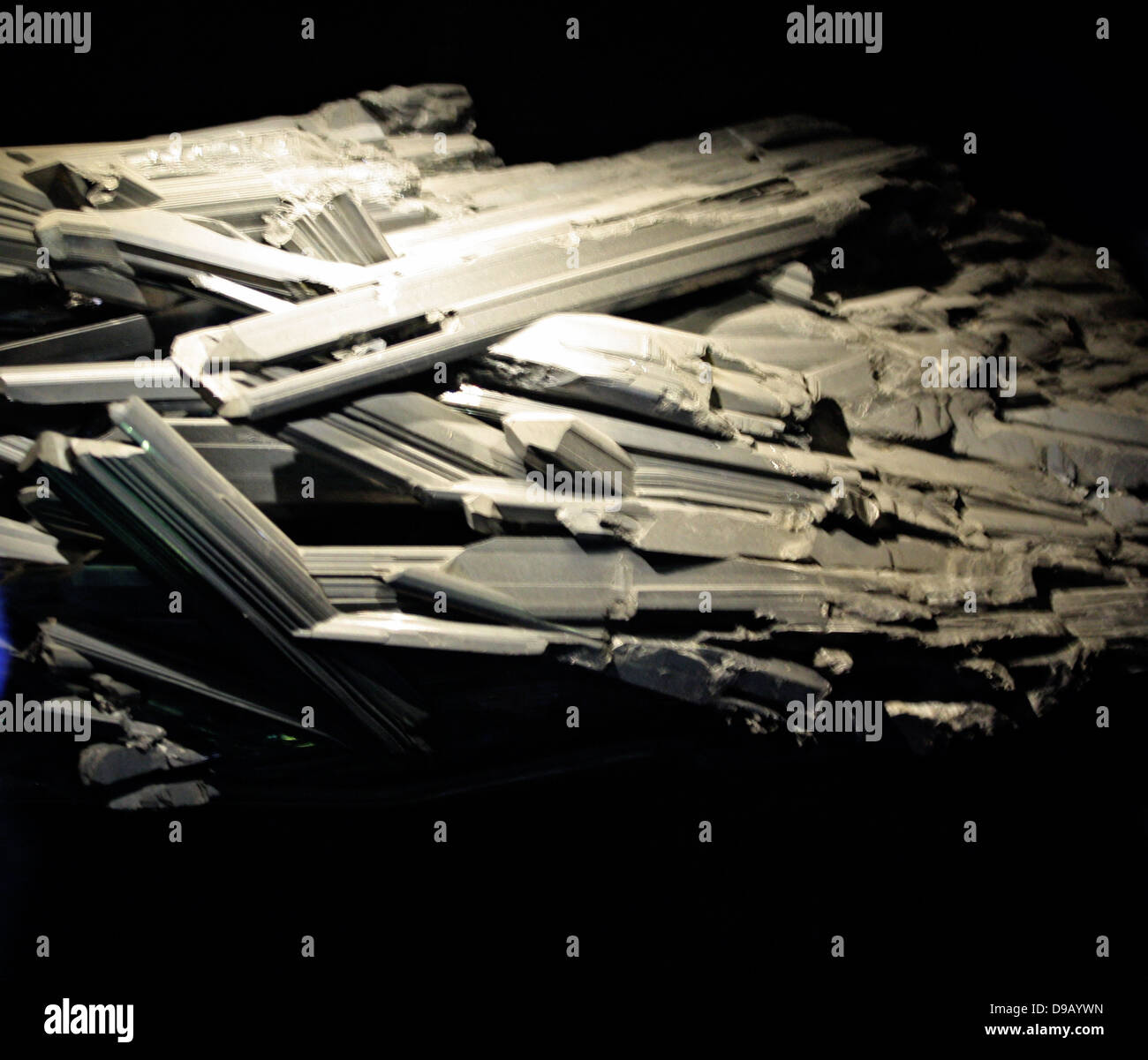 Transparent or opaque? These are crystals of the antimony ore stibnite ...