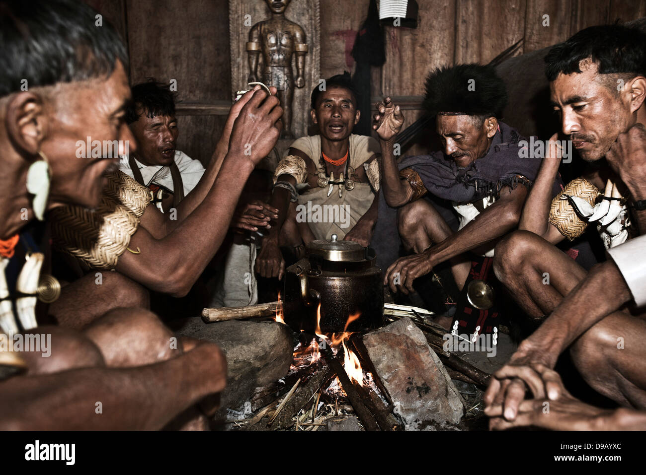 Naga tribal men cooking food in a kitchen, Hornbill Festival, Kohima ...