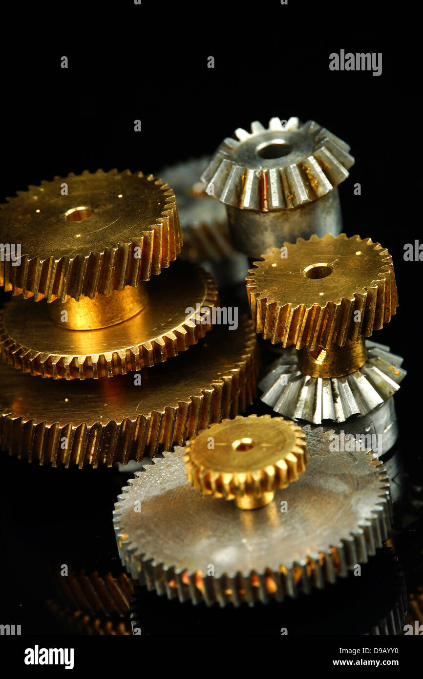 Toothed wheel on black background, close up Stock Photo - Alamy