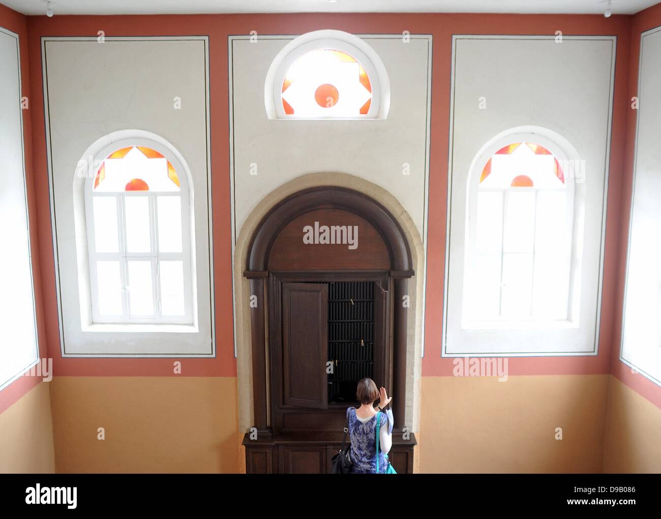 A visitor opens the Torah shrine during a press conference on ...