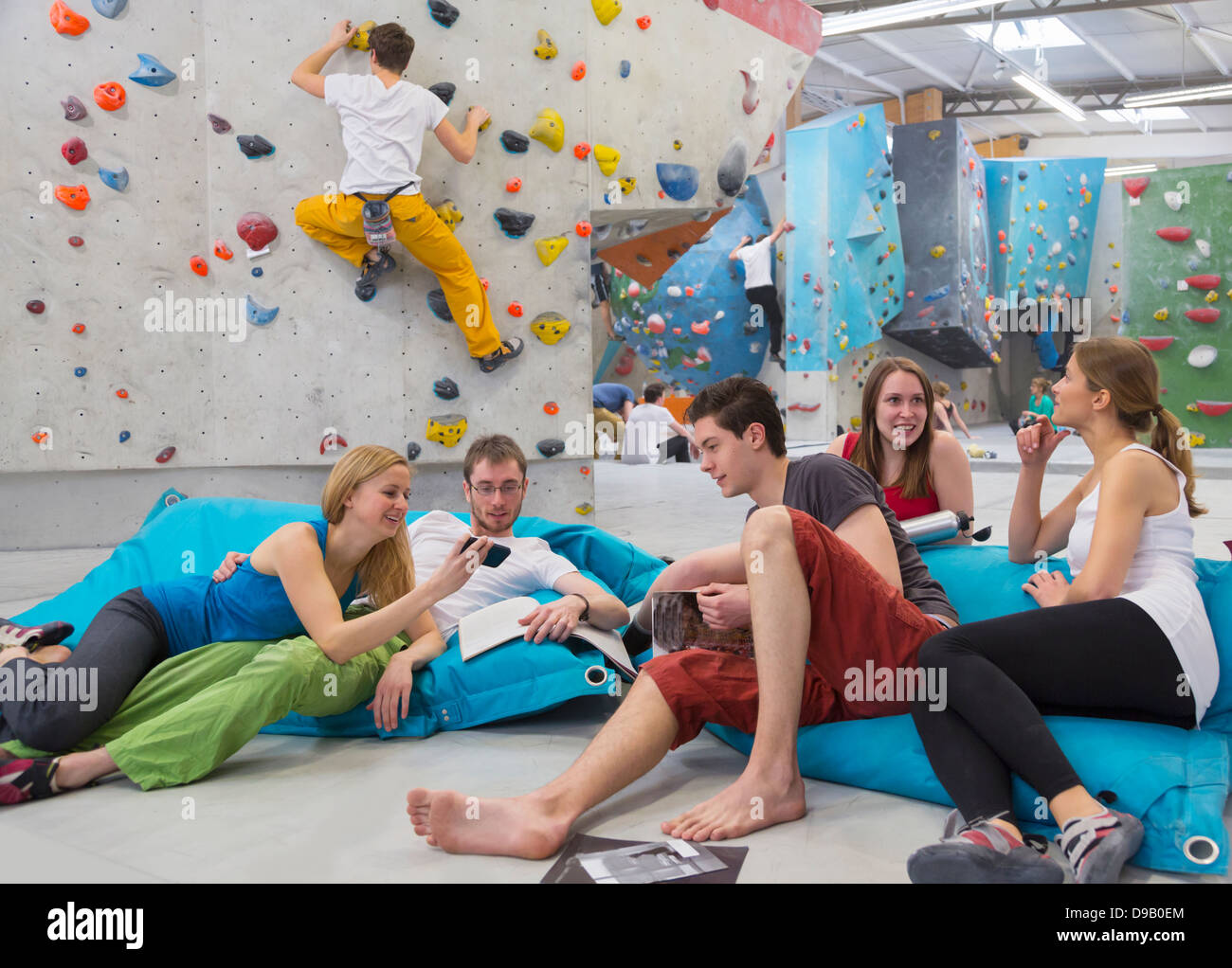Germany, Bavaria, Munich, Group of friends relaxing, smiling Stock ...