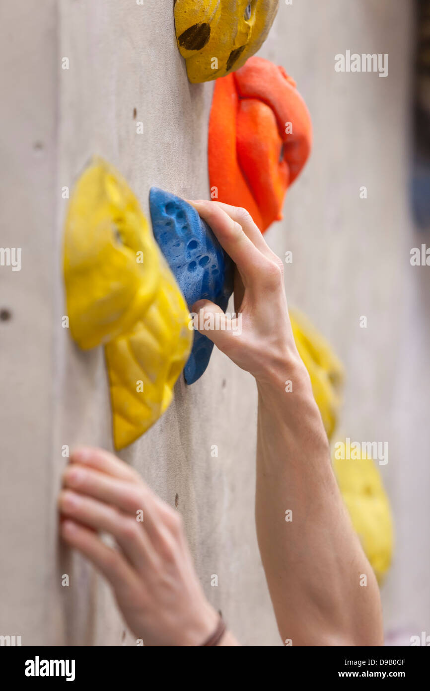 Germany, Bavaria, Munich, Young man bouldering Stock Photo - Alamy