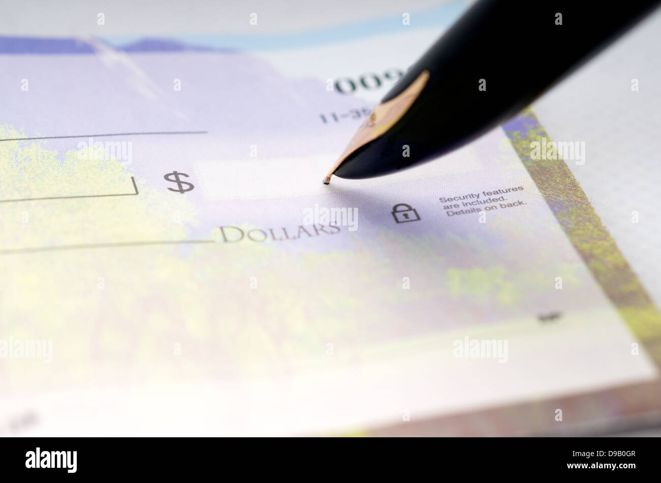 Writing a check Stock Photo - Alamy