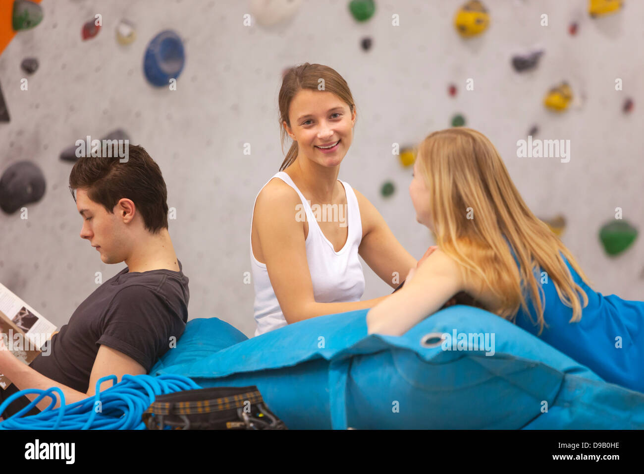 Germany, Bavaria, Munich, Group of friends relaxing, smiling Stock ...