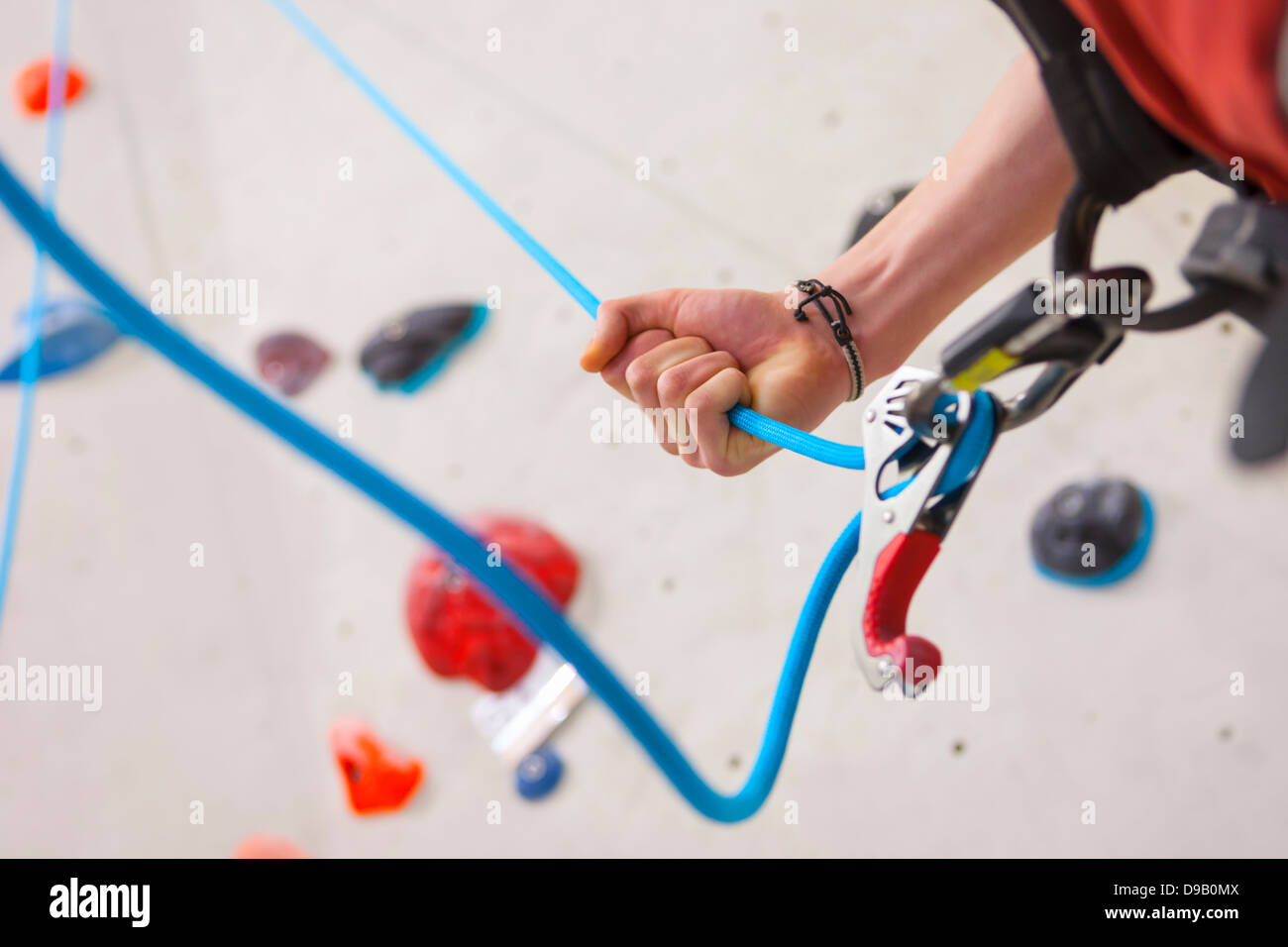 Germany, Bavaria, Munich, Human hand holding climbing hook Stock Photo ...