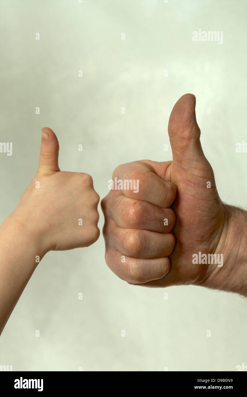 Germany, Baden Wuerttemberg, Constance, Human hands with thumbs up ...