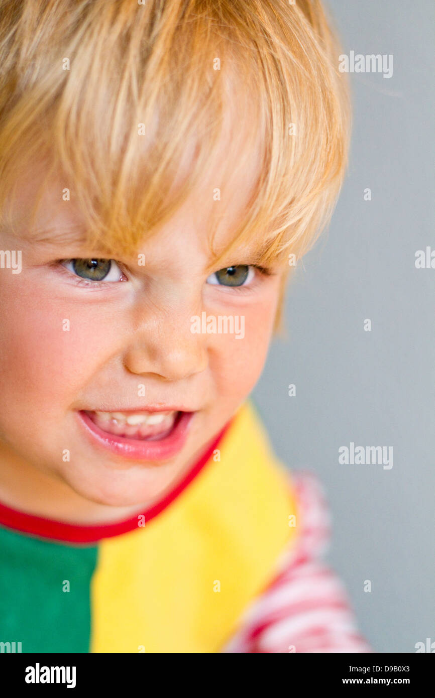 Angry girl clenching teeth, close up Stock Photo - Alamy