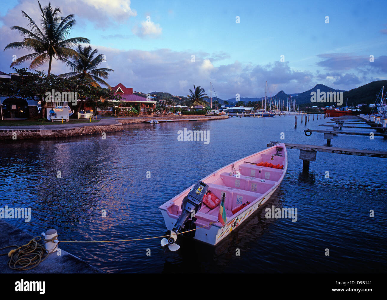 An empty pink motor boat in Rodney Bay marina, on the tropical island ...