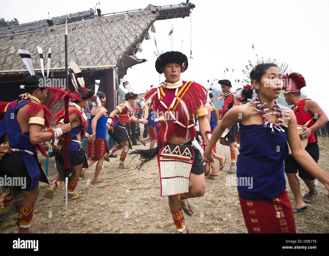 Naga tribal people dancing in traditional costumes, Hornbill Festival ...
