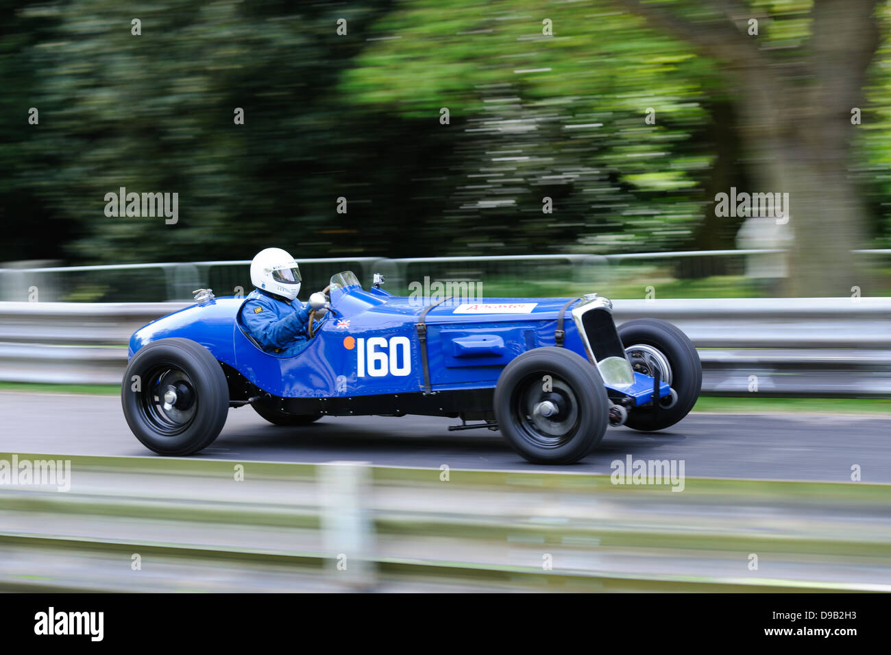 A car racing around Crystal Palace Park in London for the Motorsport at ...