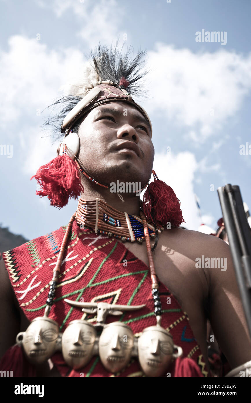 Naga tribesman in traditional outfit during the annual Hornbill ...